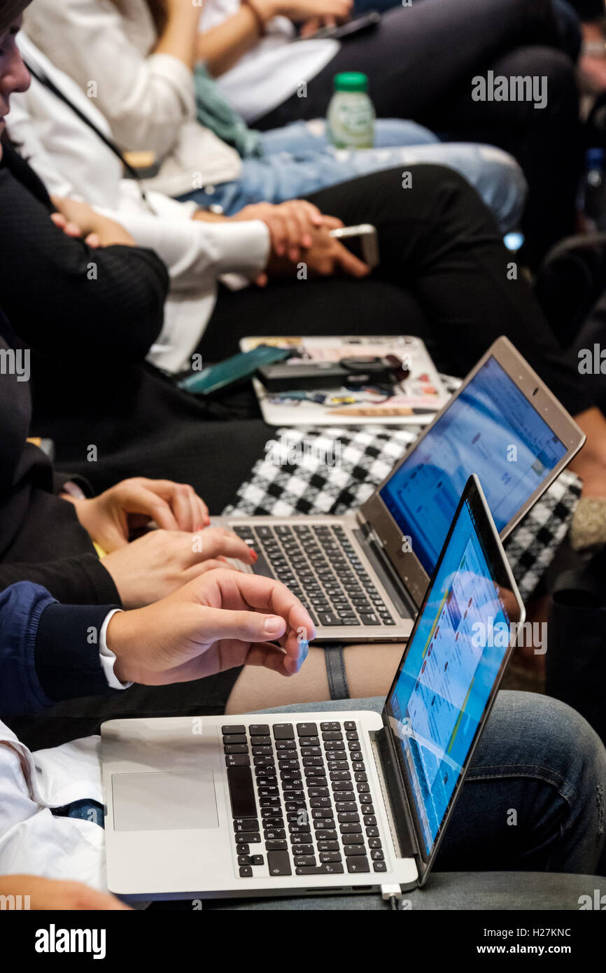 Audience at conference using laptops Stock Photo - Alamy