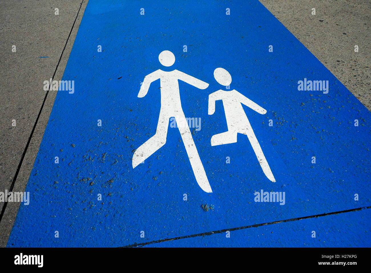 People crossing pedestrian lane hi-res stock photography and images - Alamy