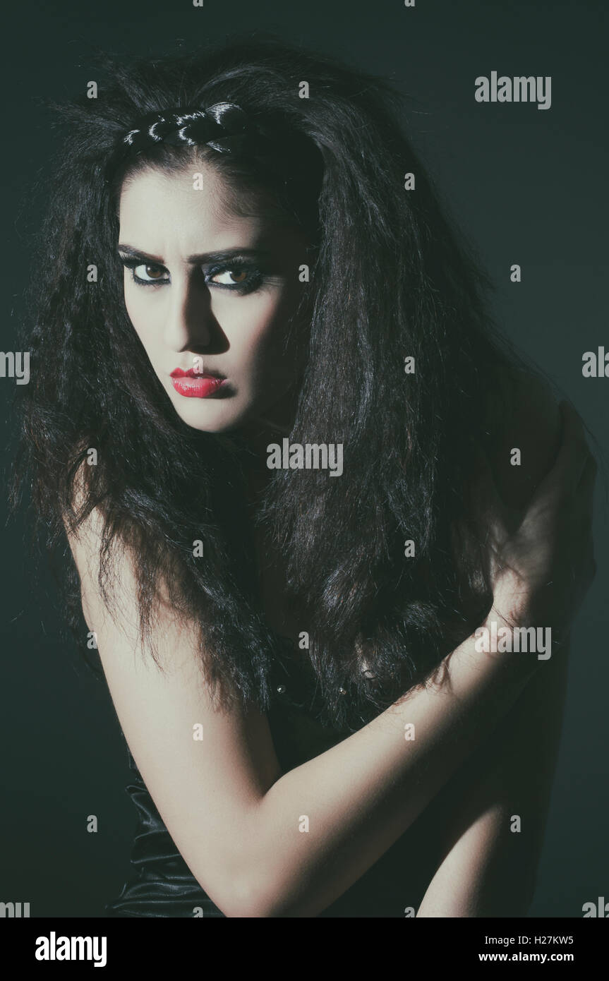 Angry young woman staring Stock Photo - Alamy