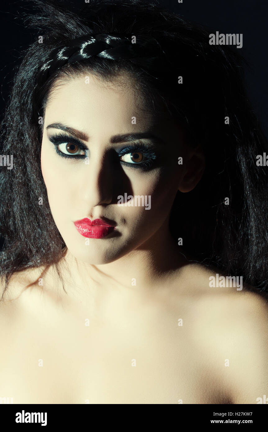 Beautiful young woman staring Stock Photo - Alamy