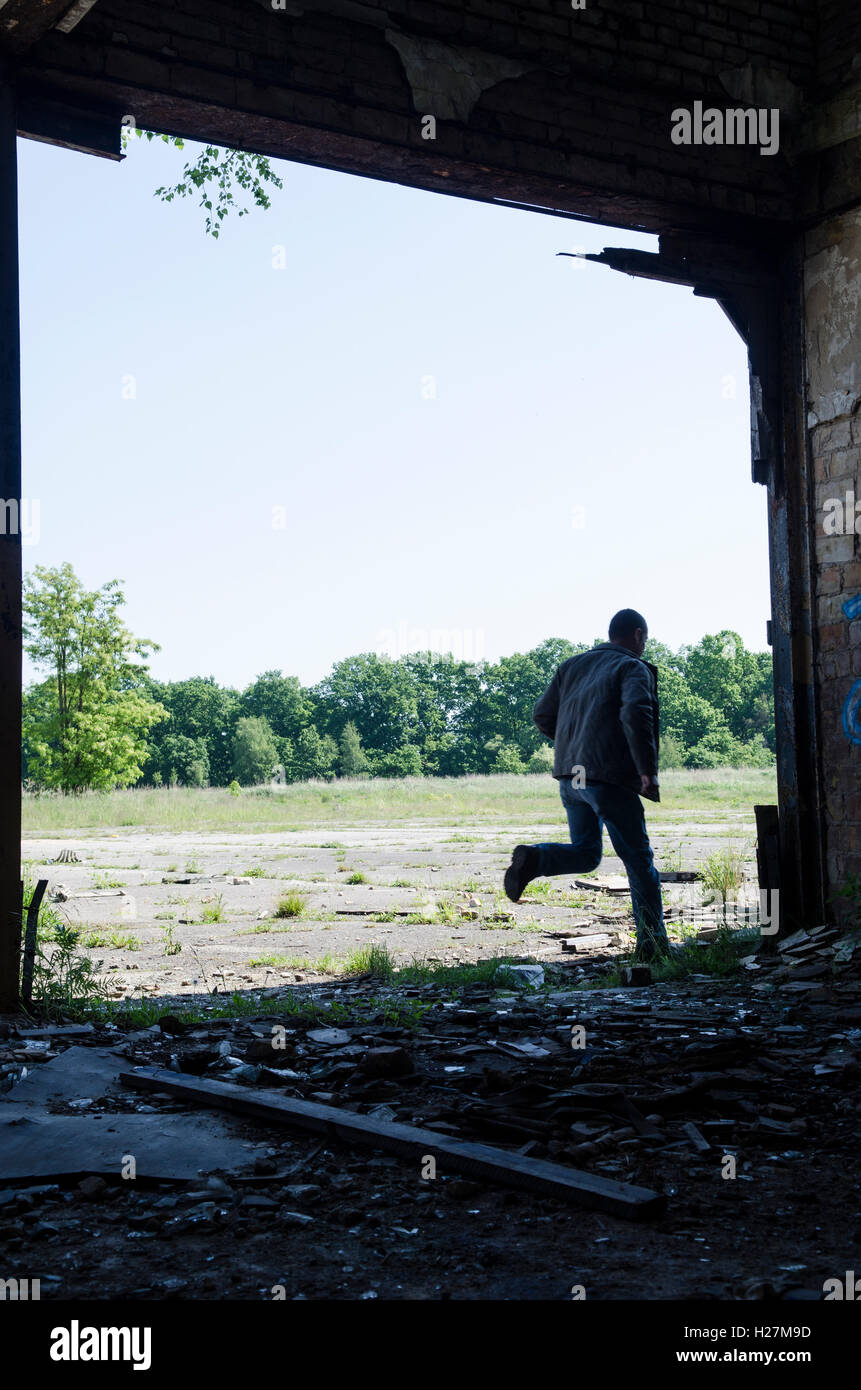 Man running rear view outside crime hi-res stock photography and images ...