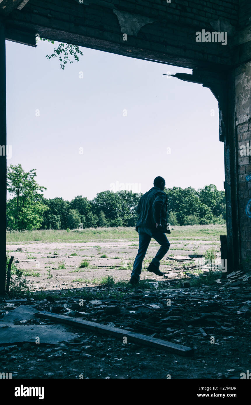Man running rear view outside crime hi-res stock photography and images ...