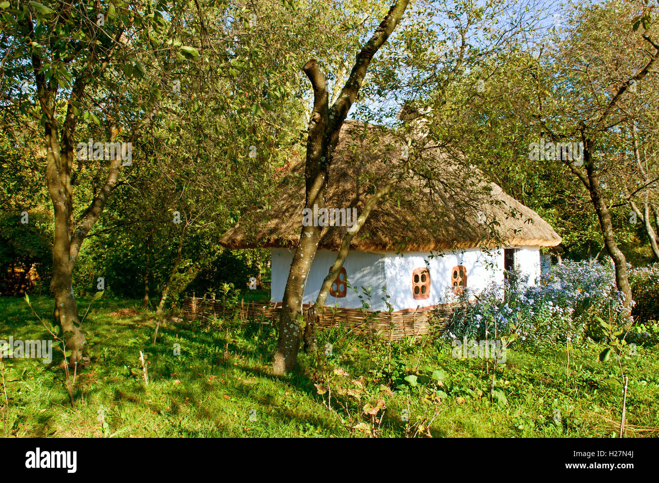 old house with a thatched roof Stock Photo - Alamy