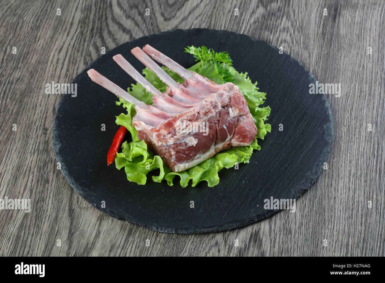 Lamb Frenched Rack 4 rib bone Stock Photo - Alamy