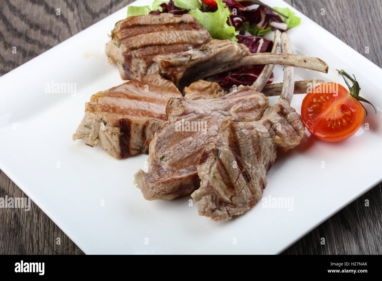 Lamb Frenched Rack grilled rib bone Stock Photo - Alamy