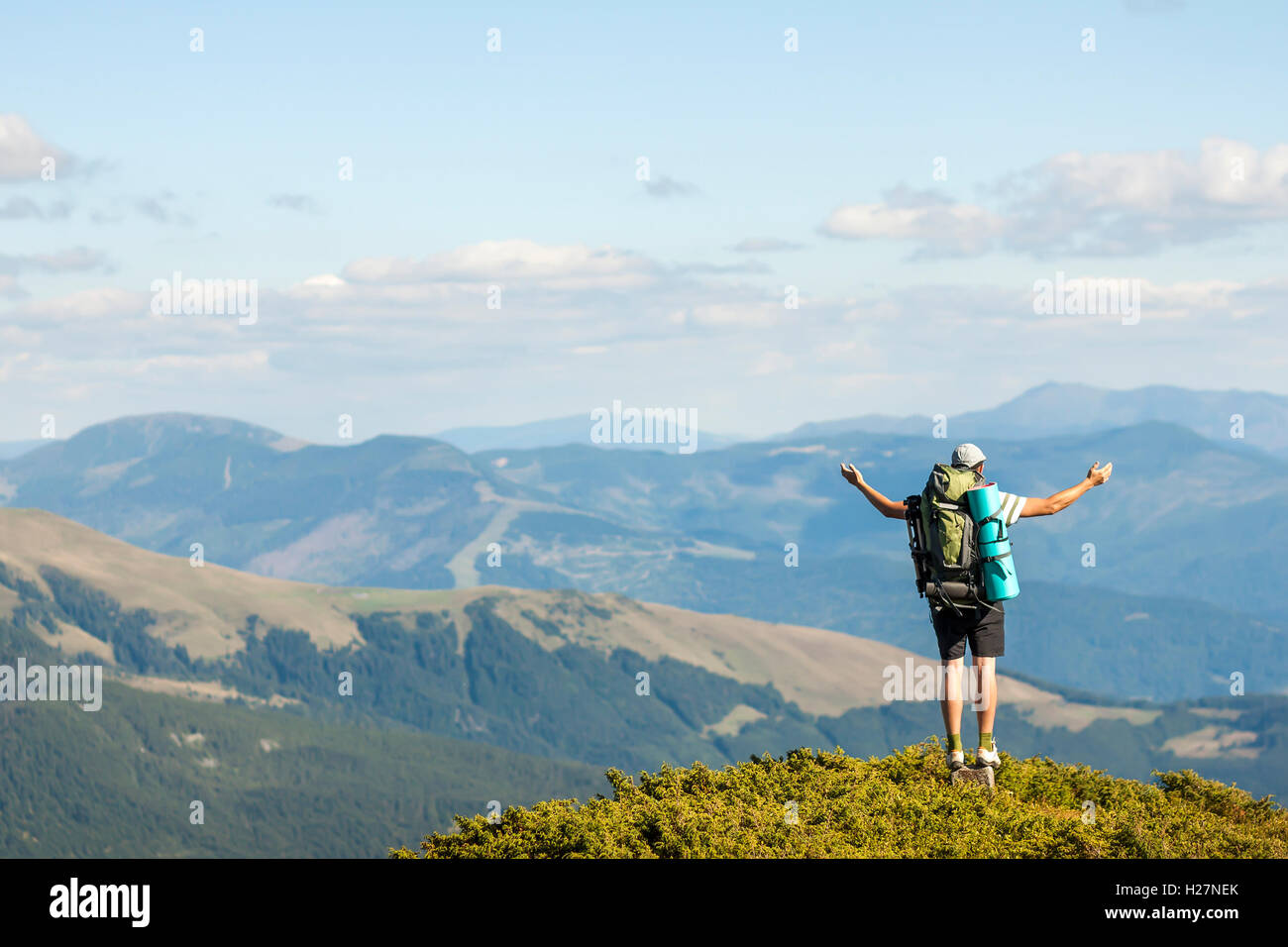 Hiker standing on top of mountain. Unity with nature concept Stock ...