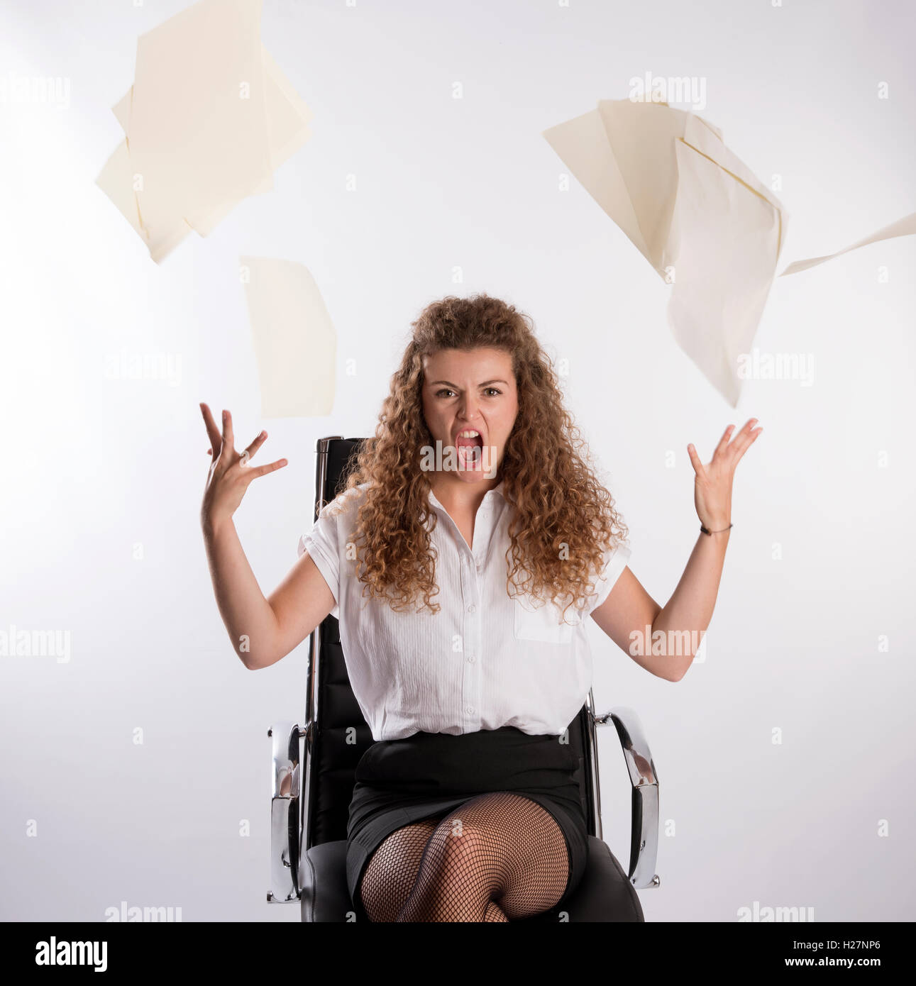 Woman sitting chair angry hi-res stock photography and images - Alamy