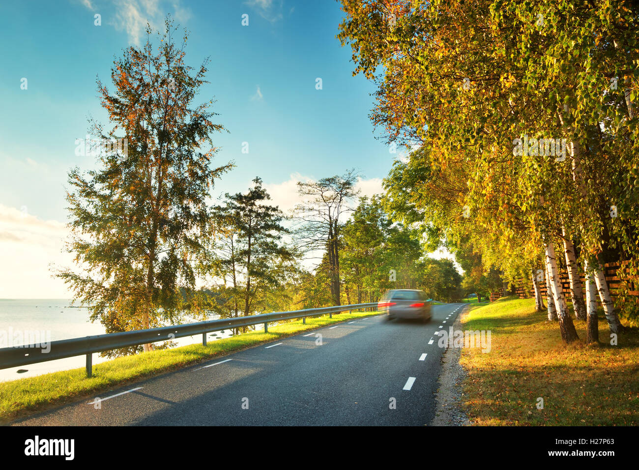 asphalt road with moving car Stock Photo - Alamy
