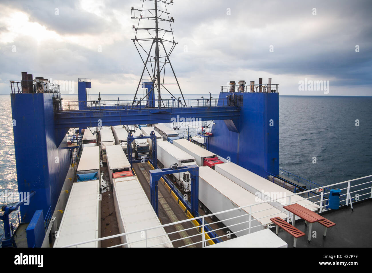 Color image of some trucks loaded on the deck of a ferry boat Stock ...