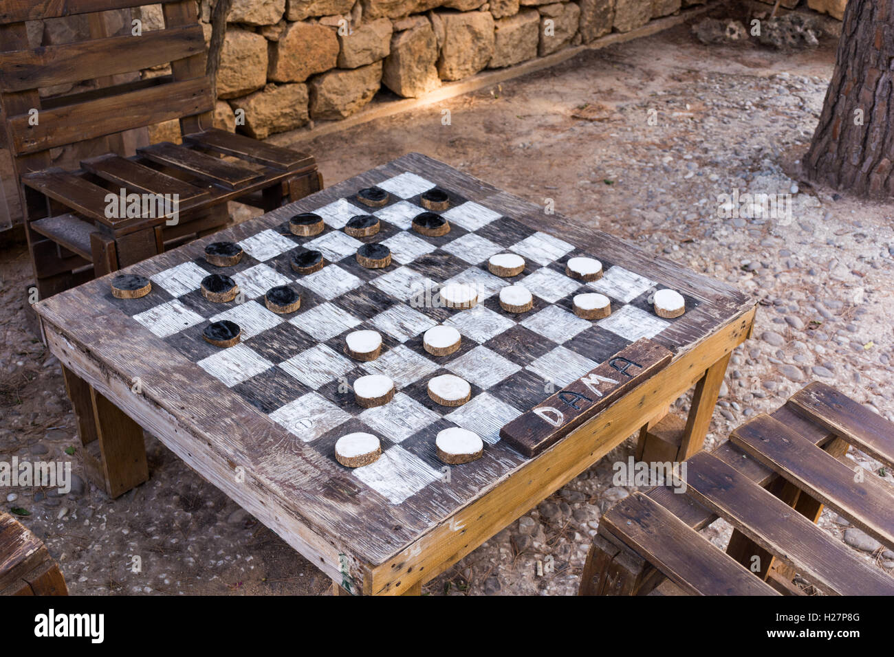 The board games checkers. All of wood, by recycling used materials ...