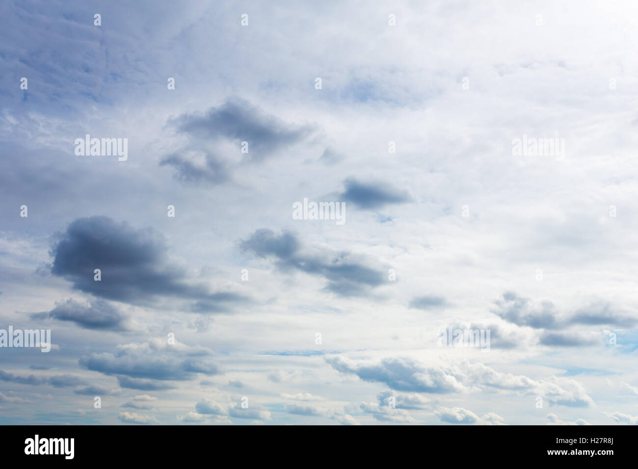 Blue sky and clouds in backlight, day Stock Photo - Alamy