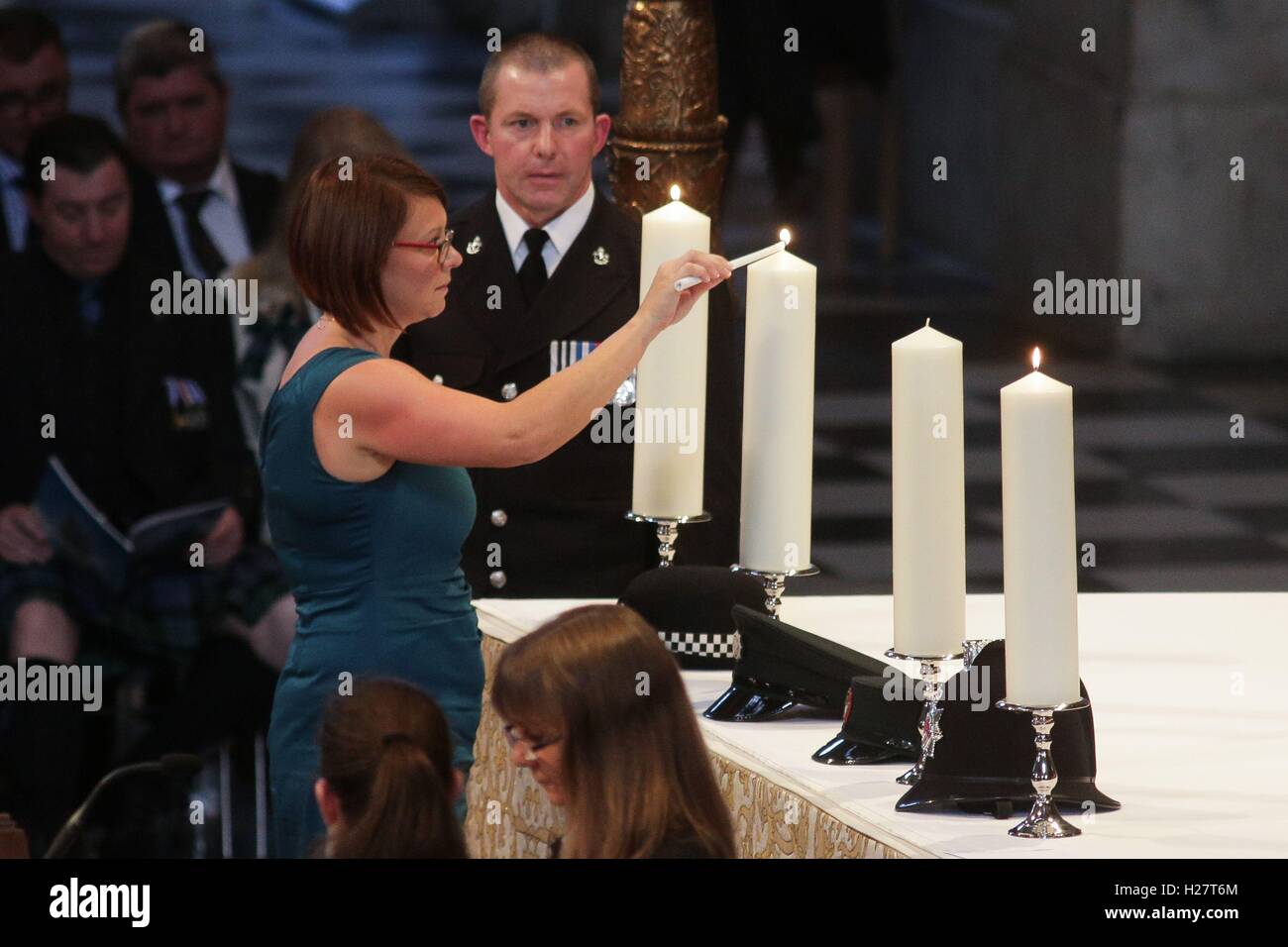 Candles are lit during the service to commemorate National Police ...