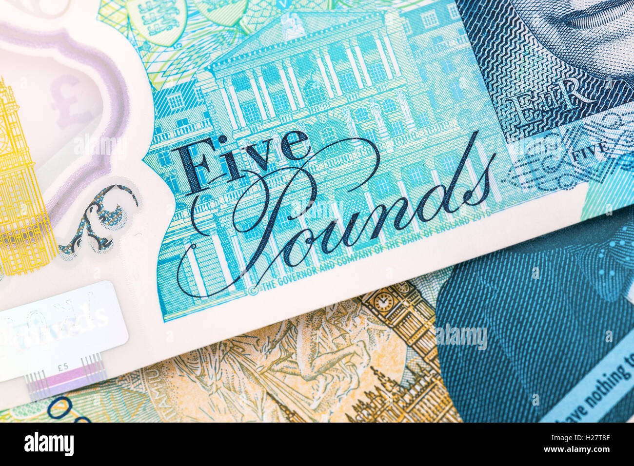 The new polymer five pound ( £5 ) note with enhanced counterfeit ...