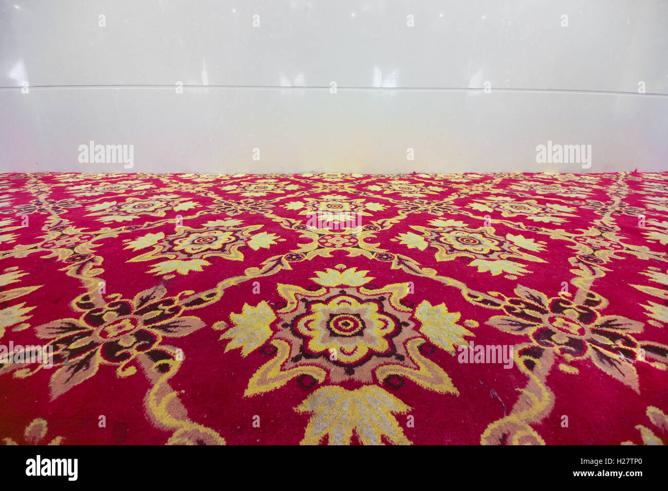 Red carpet with chinese design in a restaurant at Yongding town, Fujian ...