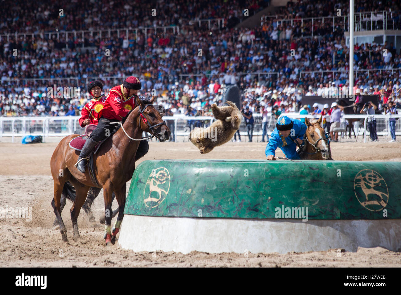 Horsemen play the traditional Central Asia sport 'Kok Boru' at the ...