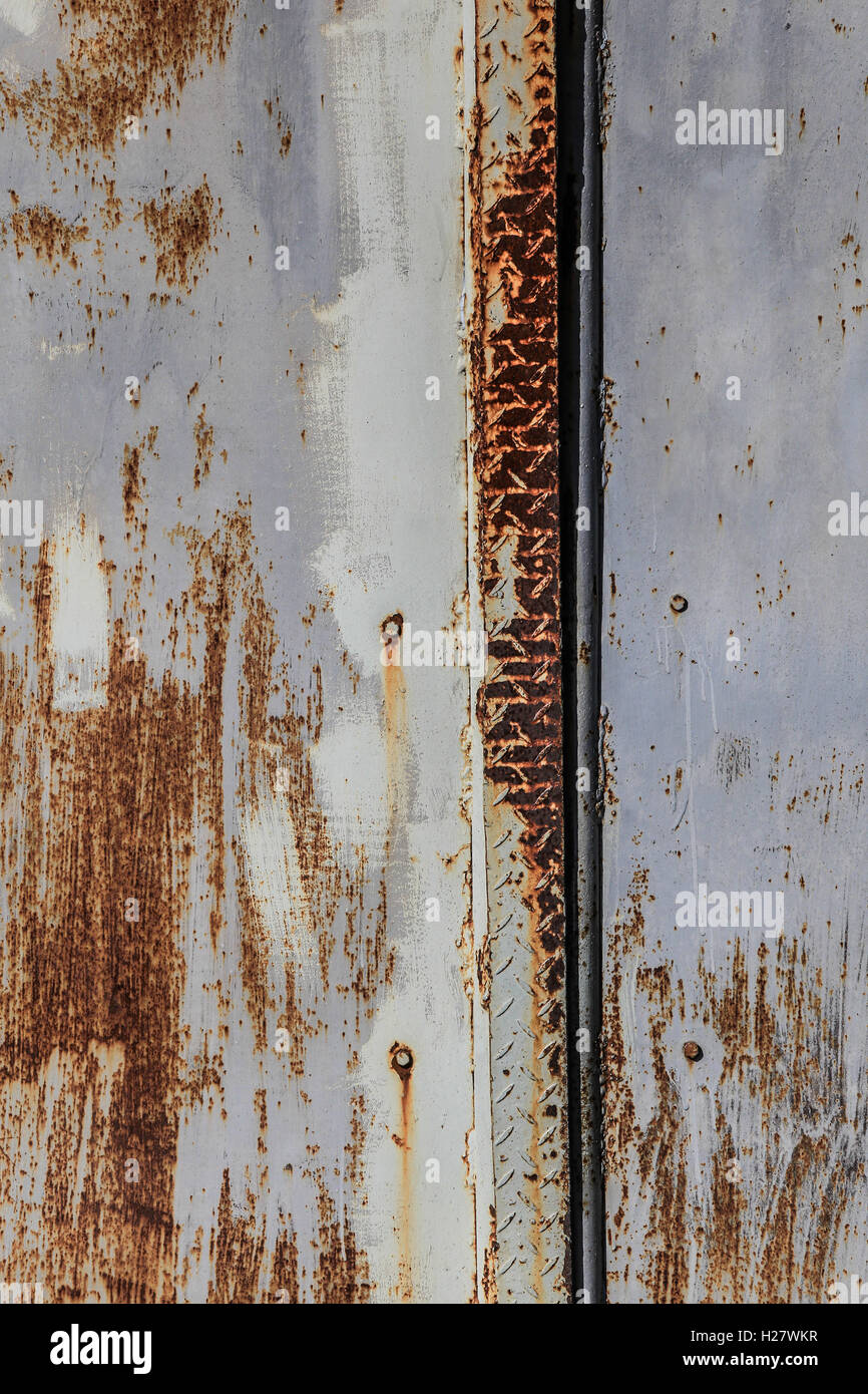 Corroded white metal background. Rusted white painted metal wall. Rusty ...