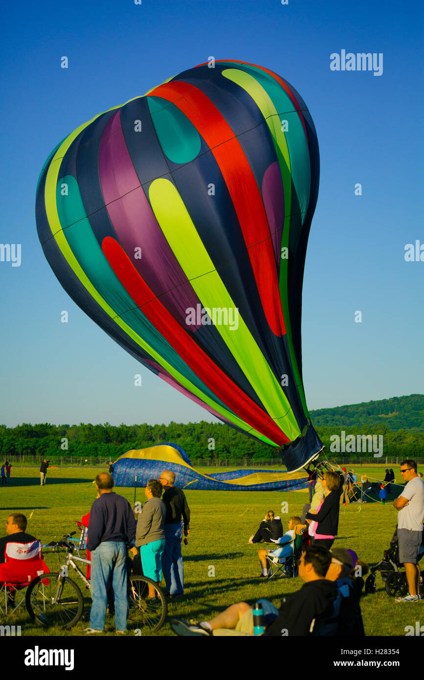 Vertical photo of a hot air balloon being filled Stock Photo - Alamy