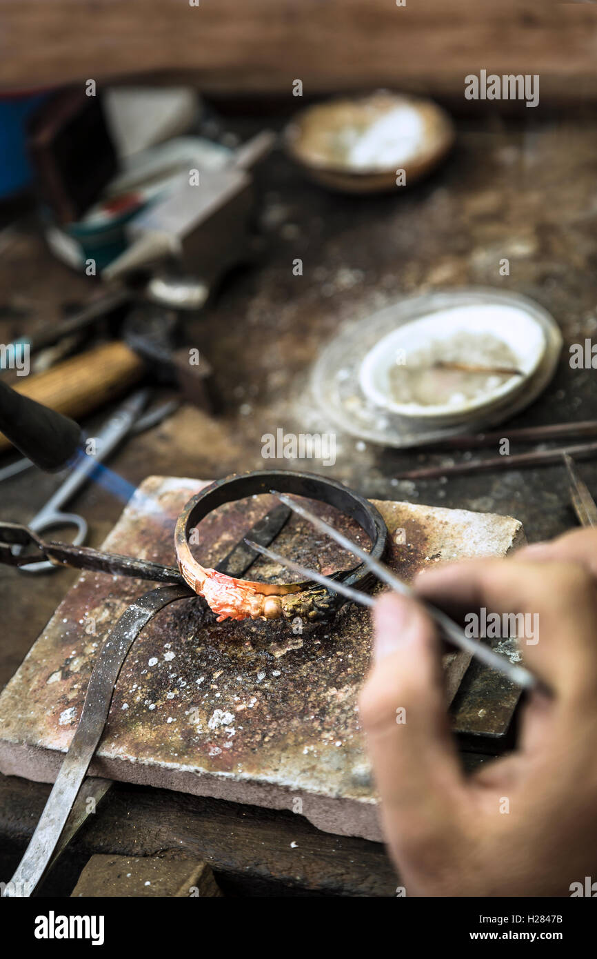 Jeweler welding gold traditional hi-res stock photography and images ...
