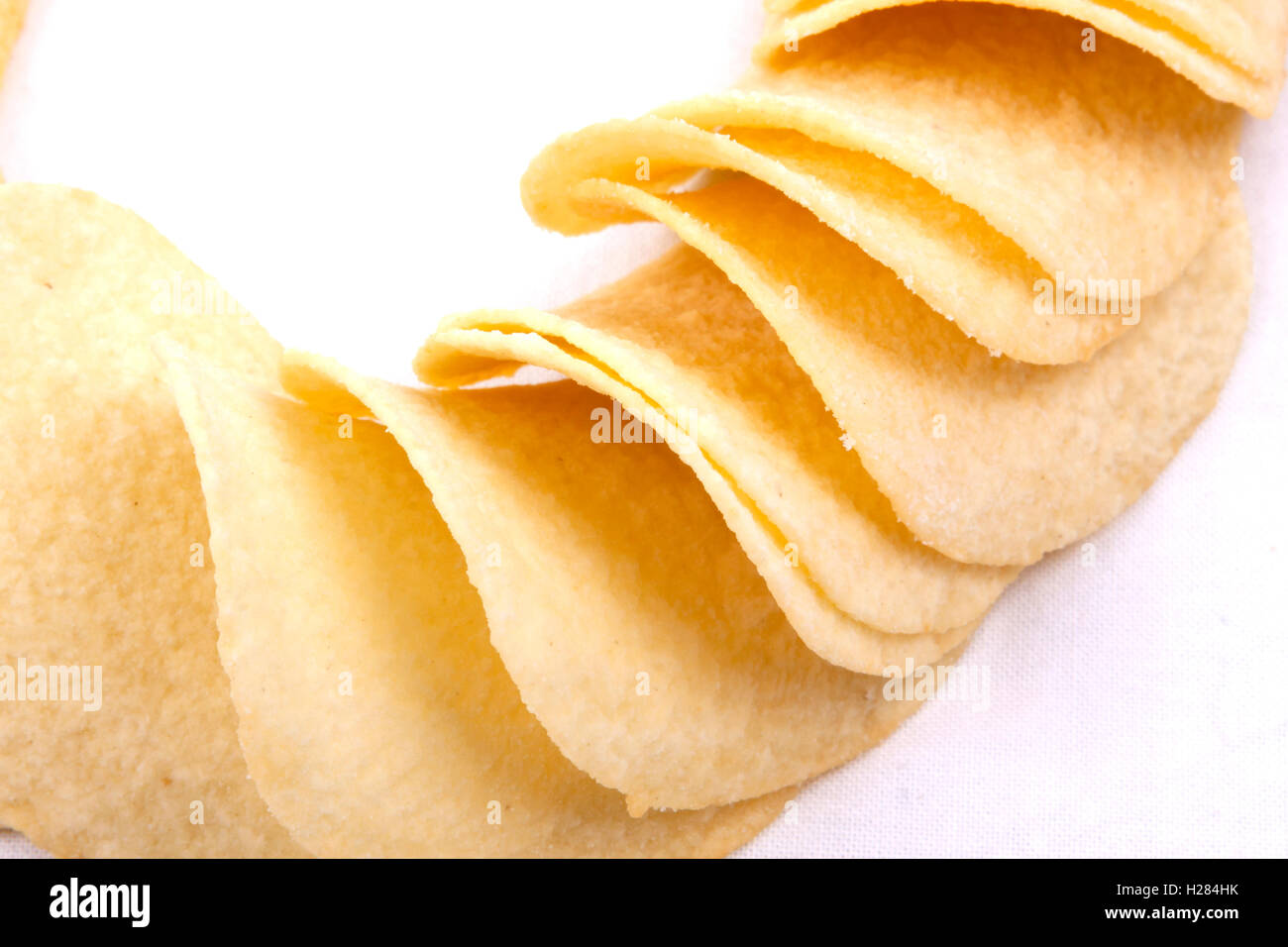 potato crisps (chips) on a white background Stock Photo - Alamy