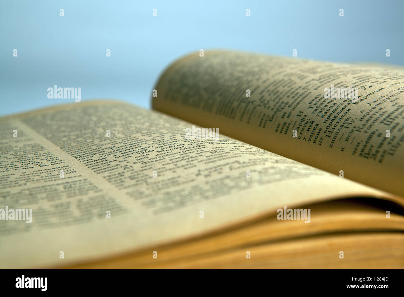 Open old book text close-up Stock Photo - Alamy