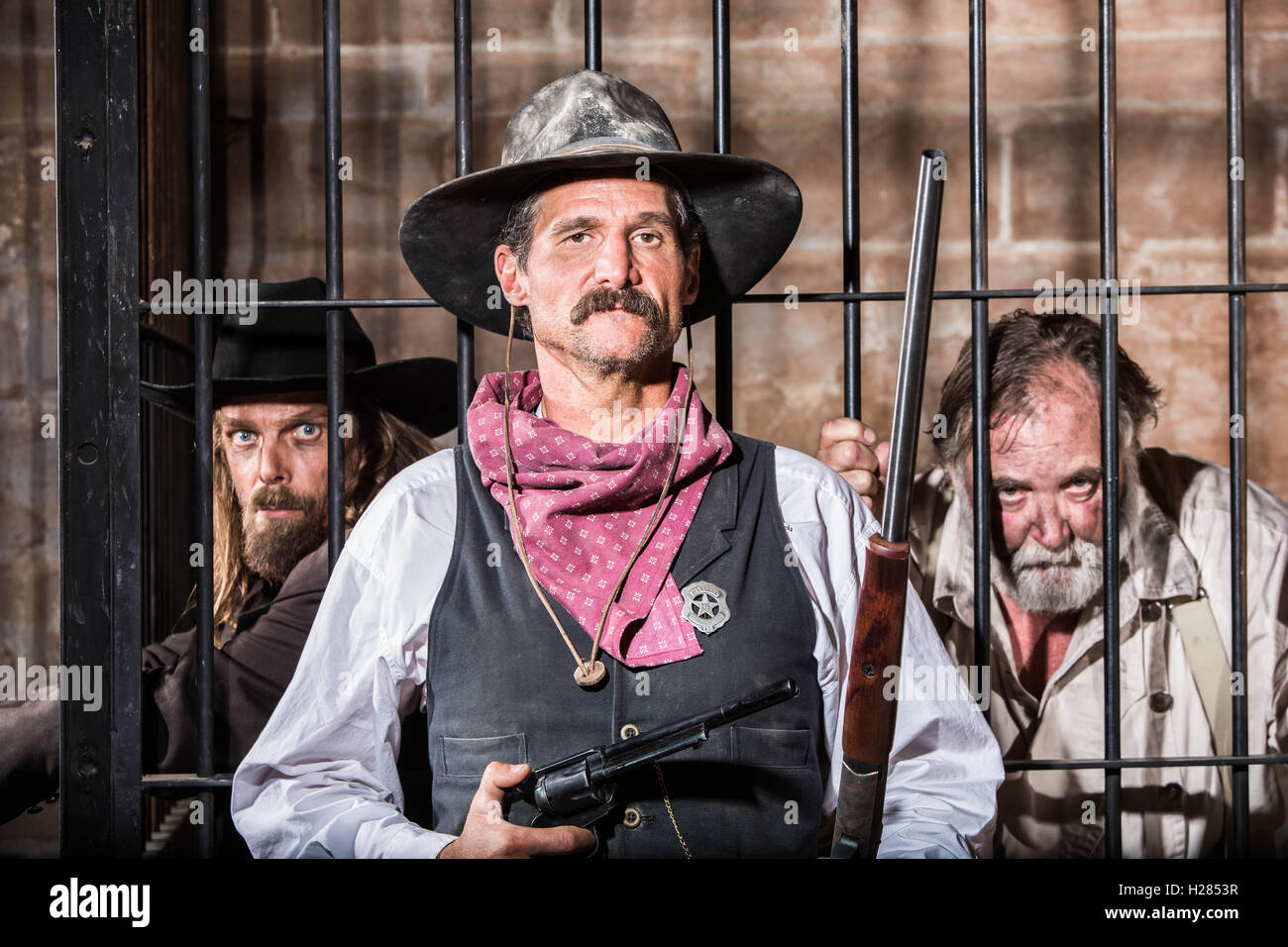 Sheriff Poses With Prisoner Stock Photo - Alamy