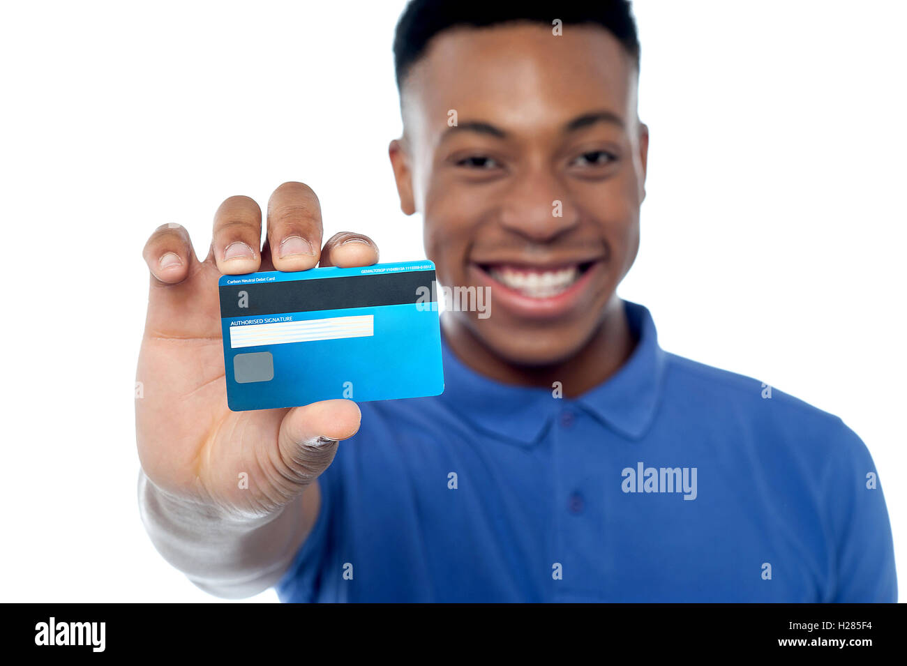 Portrait of young man holding credit card Stock Photo - Alamy Portrait of young man holding credit card Stock Photo - Alamy