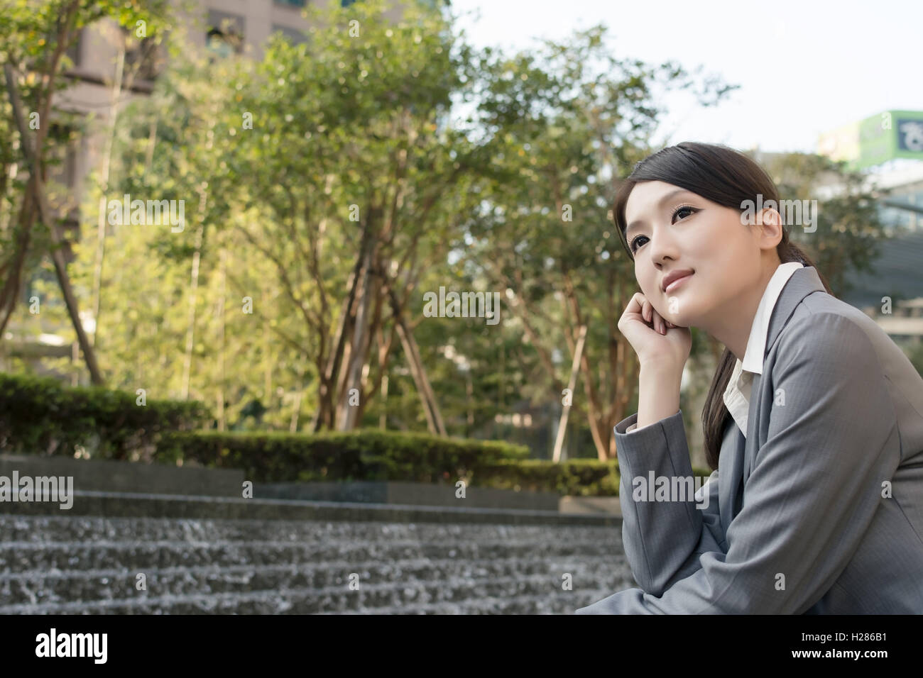 Attractive asian korean woman pondering hi-res stock photography and ...