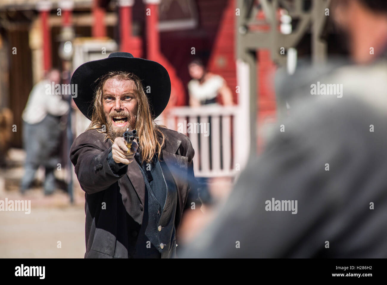 Cowboy Points Gun Stock Photo - Alamy