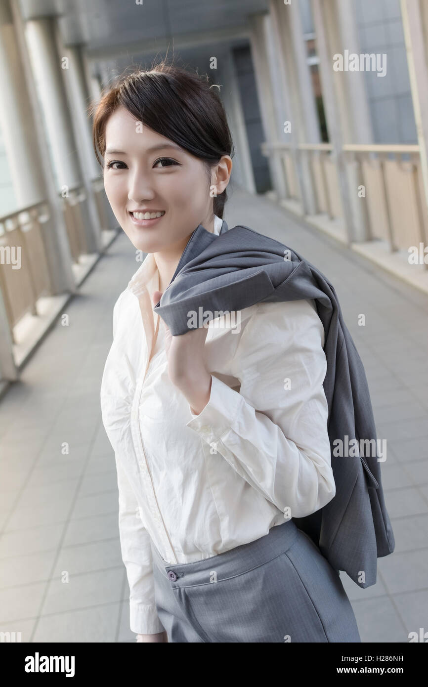 business woman go off work Stock Photo - Alamy