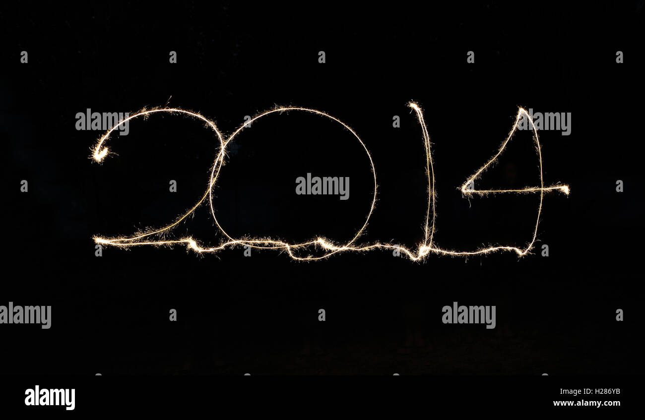 2014 written in sparkling letters Stock Photo - Alamy