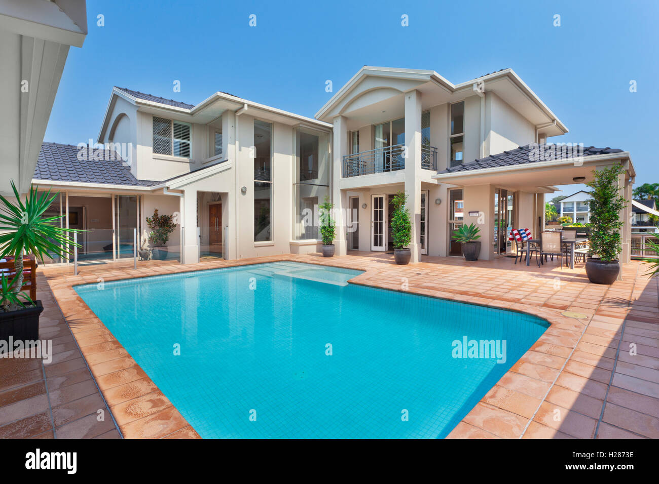 beautiful backyard with pool in australian mansion Stock Photo - Alamy