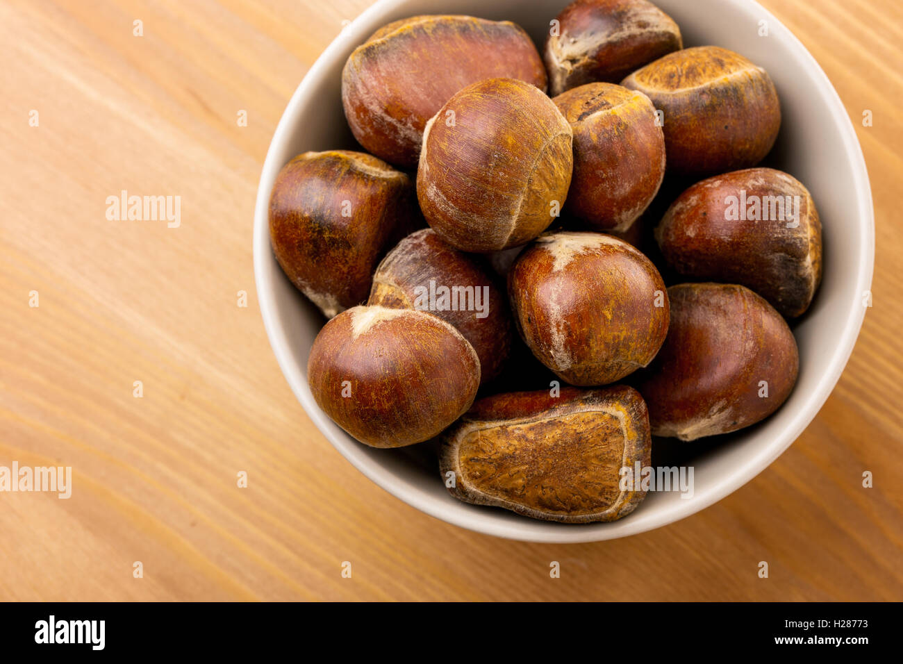 Chestnut on bowl Stock Photo - Alamy