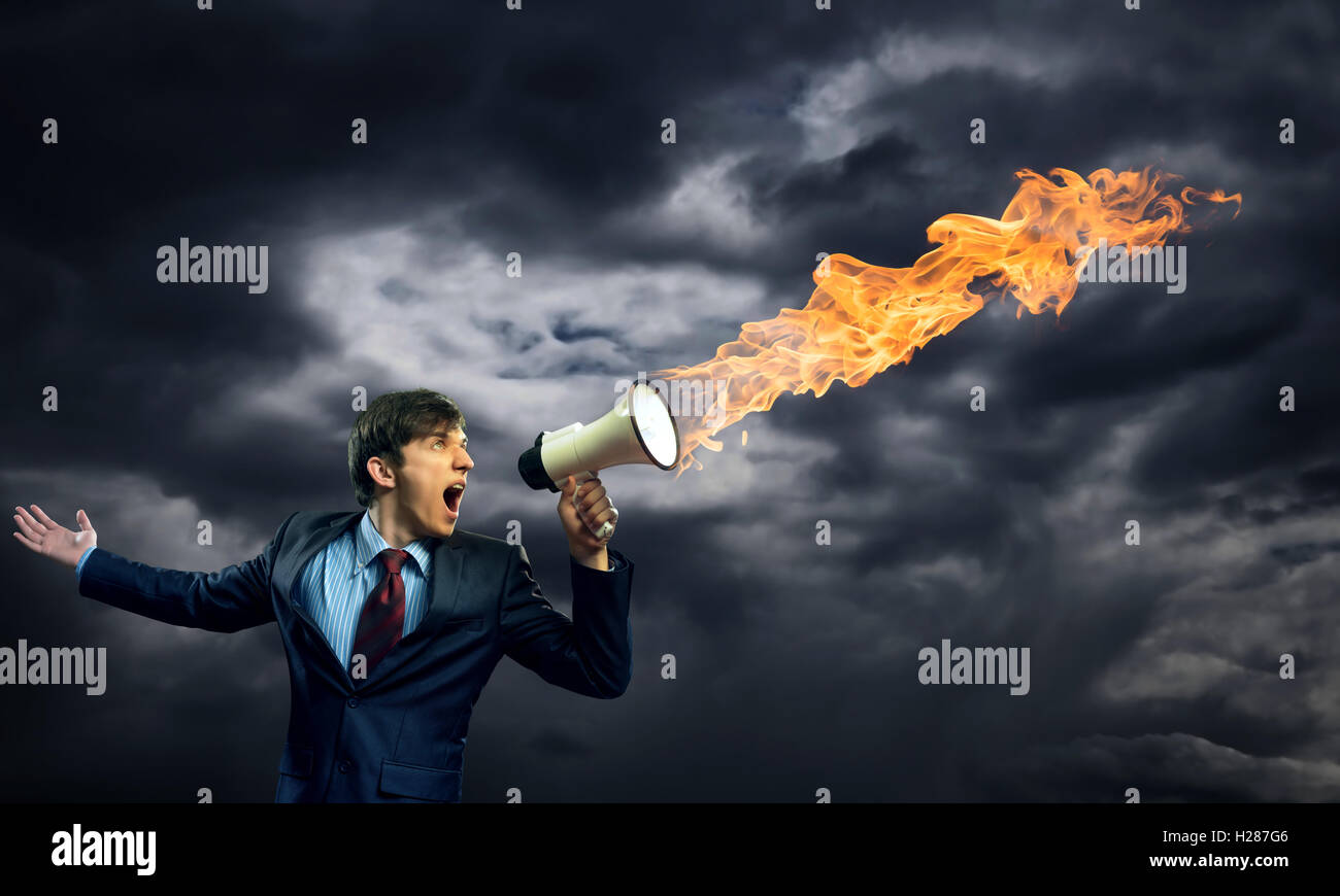 businessman shouting into a megaphone Stock Photo - Alamy
