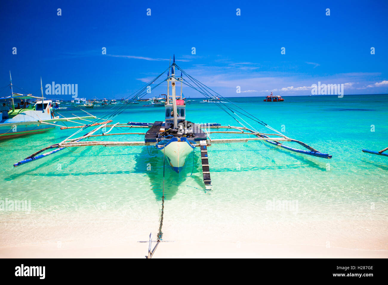 Filipino boat in the turquoise sea, Boracay, Philippines Stock Photo ...