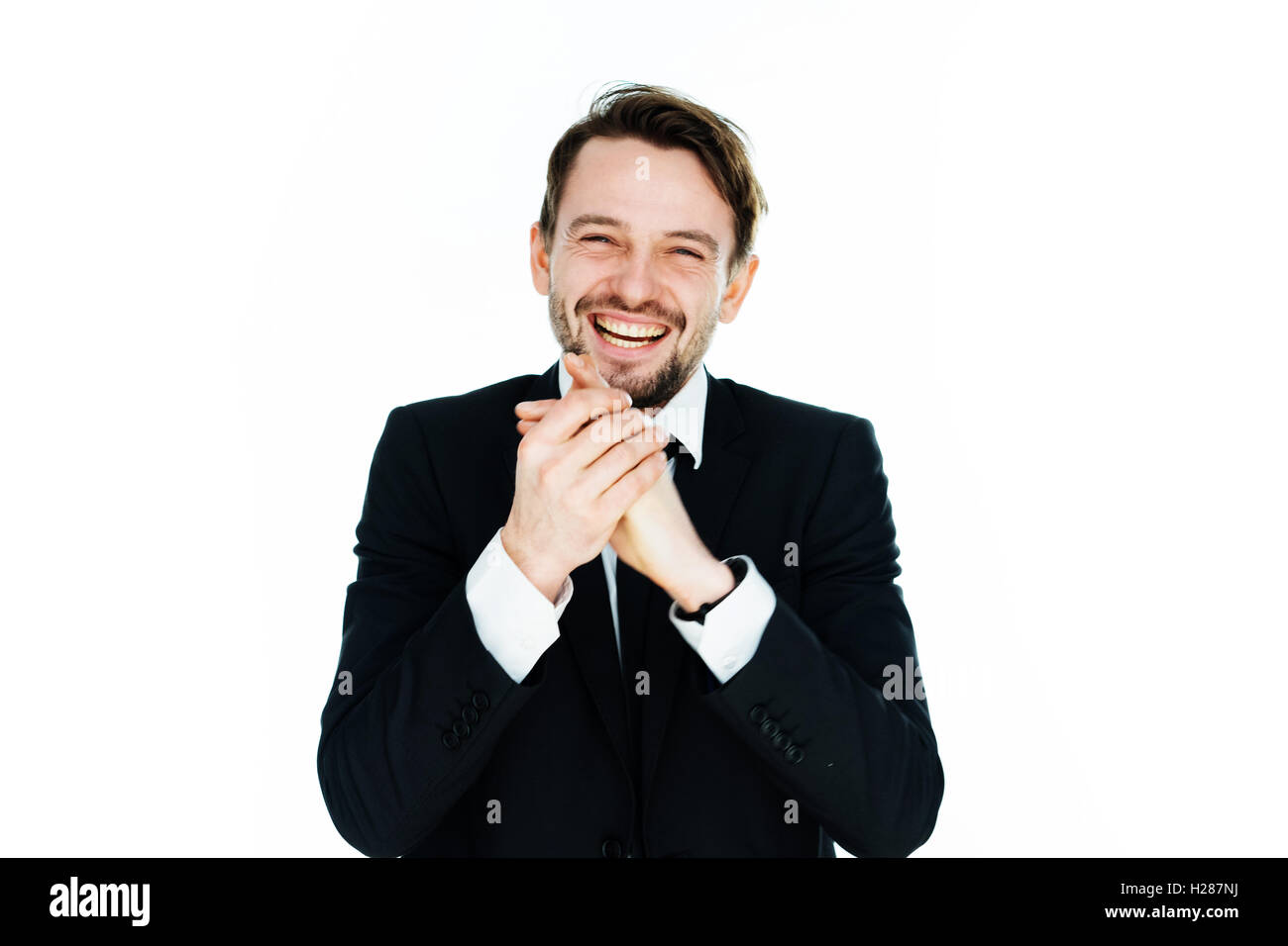 Happy businessman laughing Stock Photo - Alamy