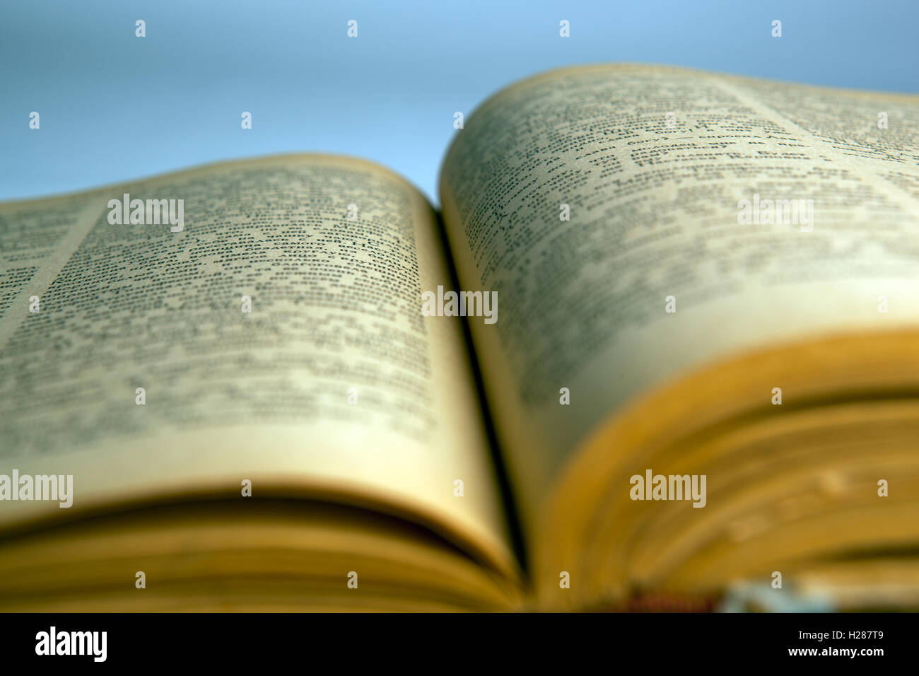 Open old book text close-up Stock Photo - Alamy