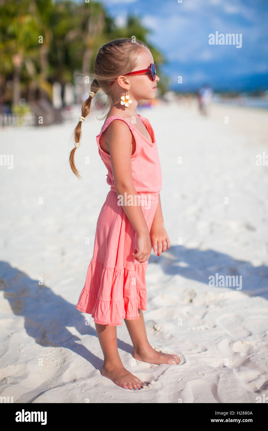 Adorable little girl on tropical beach vacation Stock Photo - Alamy
