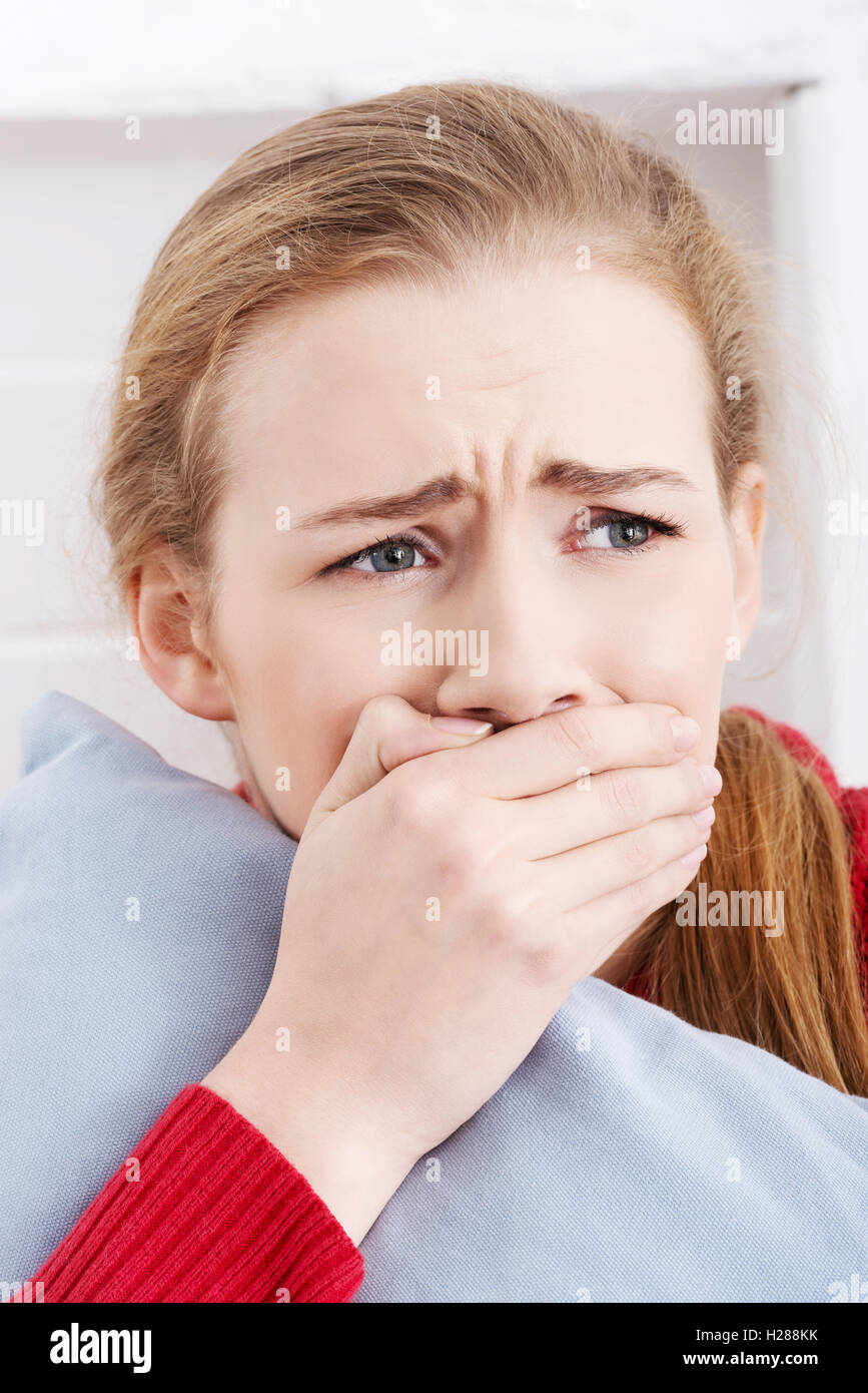 Shocked young woman pillow hi-res stock photography and images - Alamy