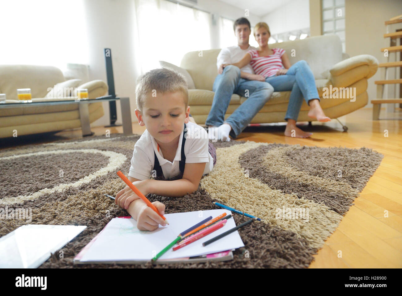 family at home Stock Photo - Alamy