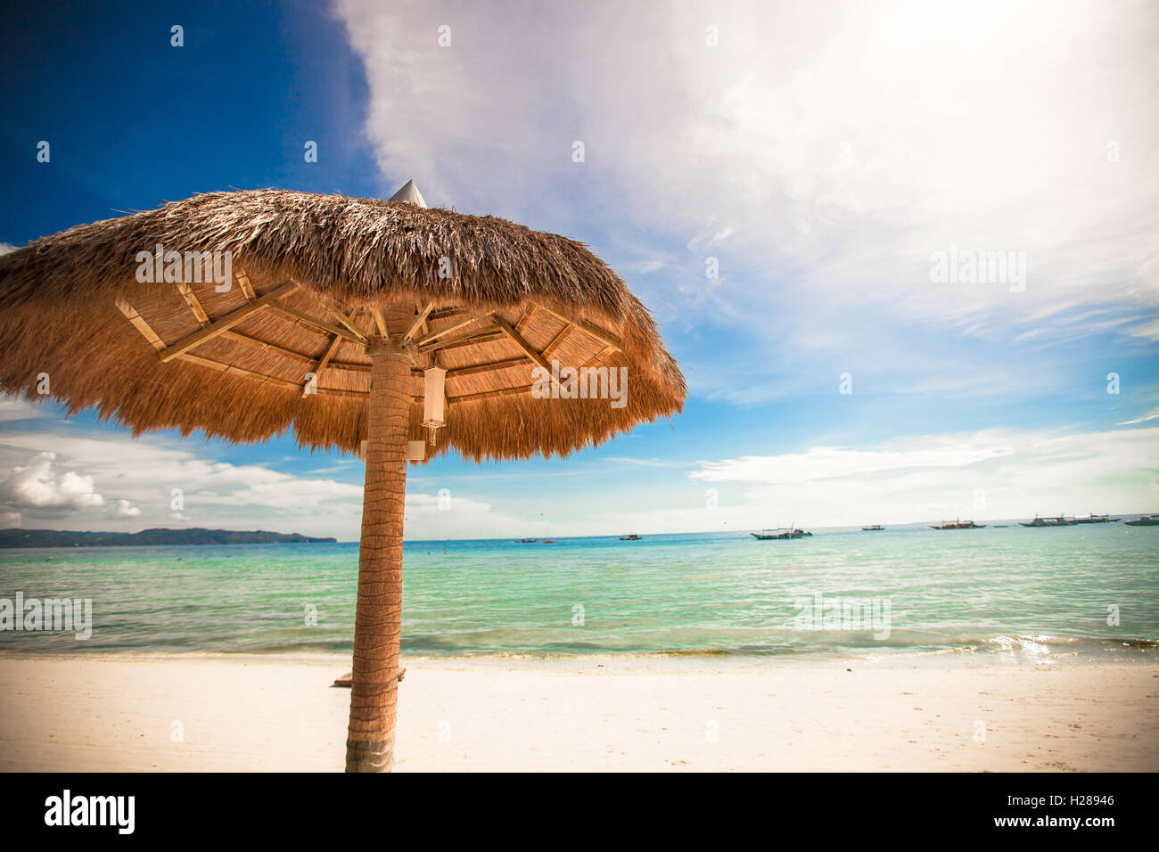 White umbrella on tropical hi-res stock photography and images - Alamy