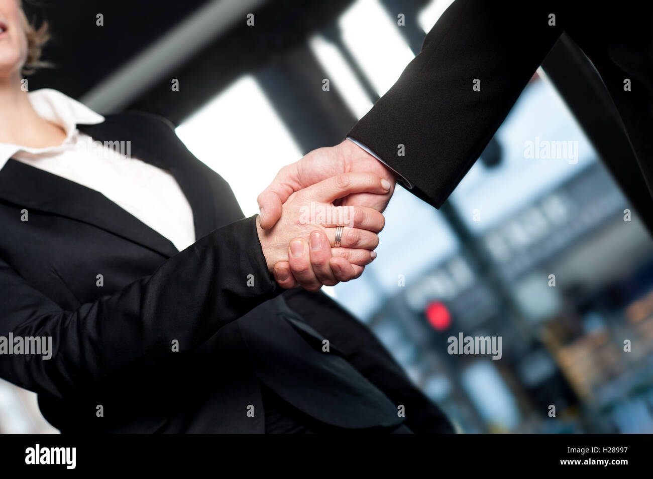 Business handshake, deal finalized Stock Photo - Alamy