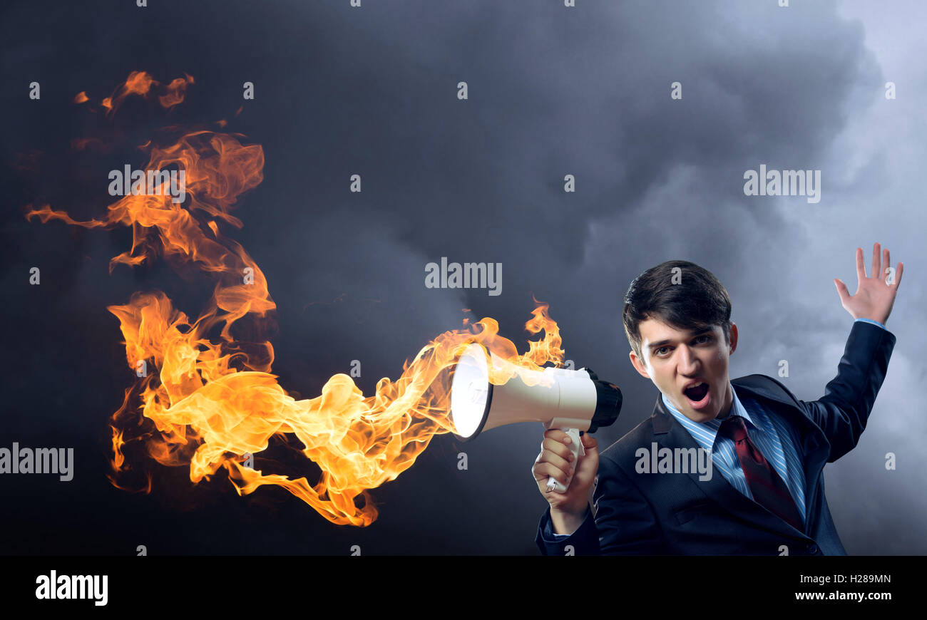 businessman shouting into a megaphone Stock Photo - Alamy