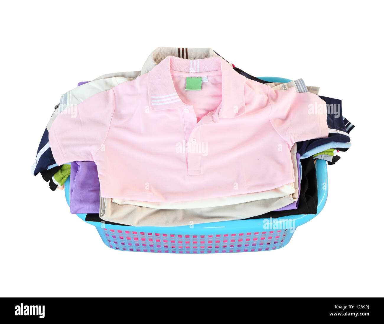 pile of clothes in basket on white background Stock Photo - Alamy
