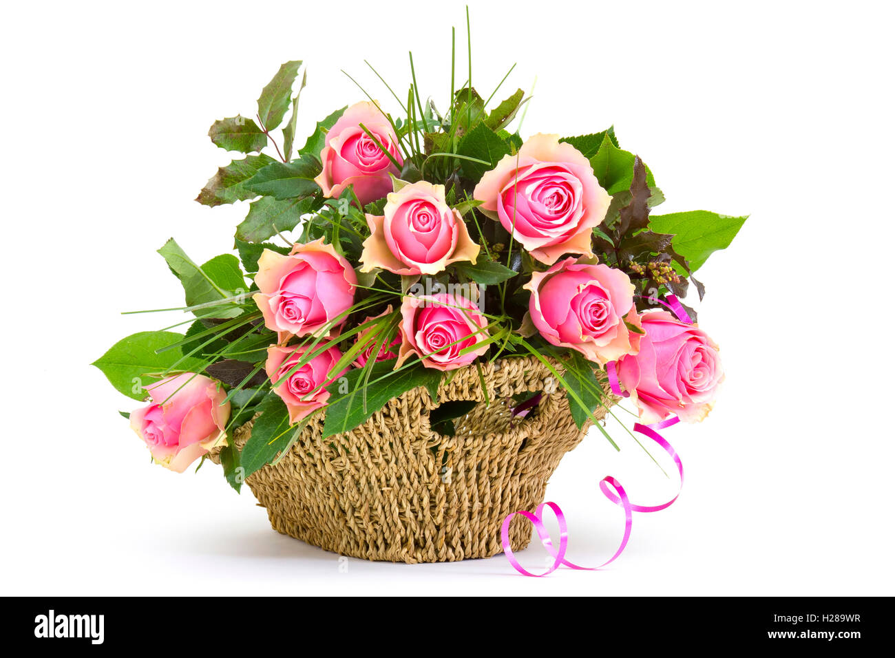 pink roses in a basket Stock Photo - Alamy