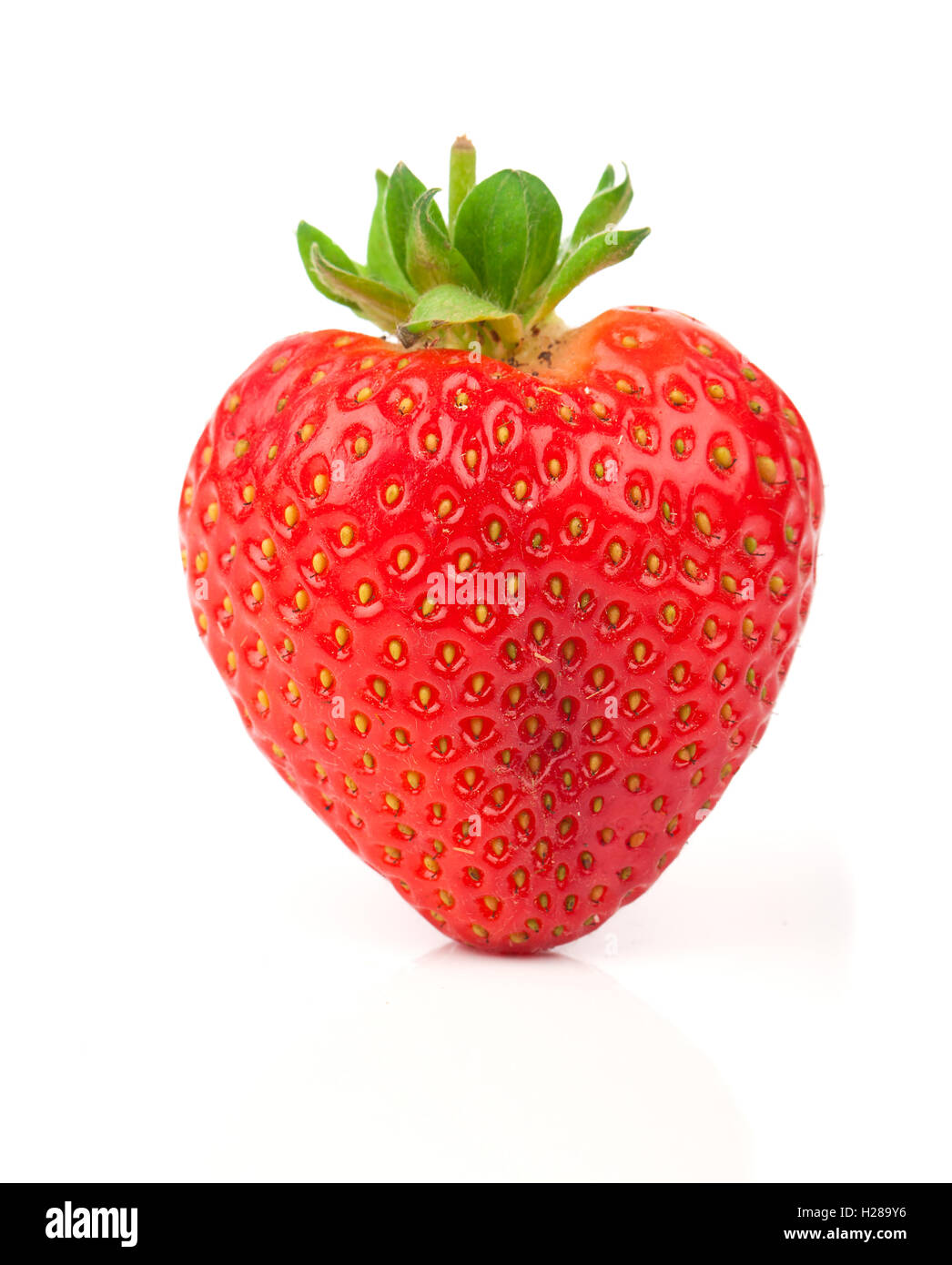 a heart shaped strawberry isolated on a white background Stock Photo ...