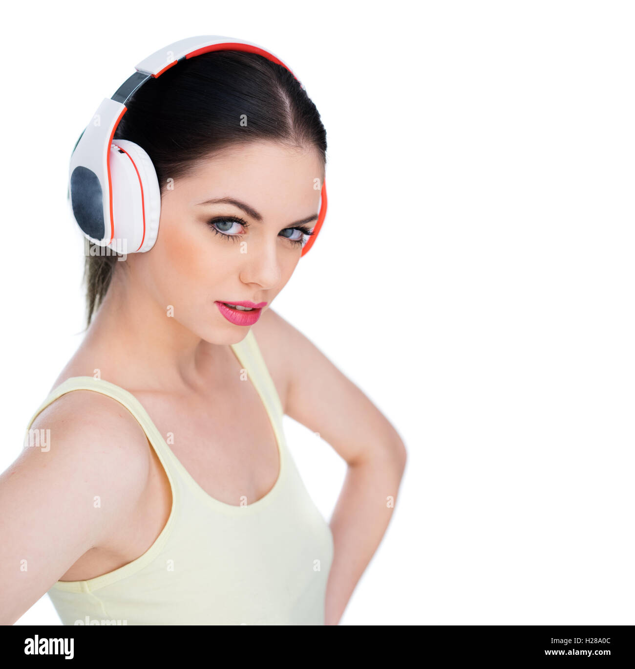 Attractive young woman wearing headphones Stock Photo - Alamy