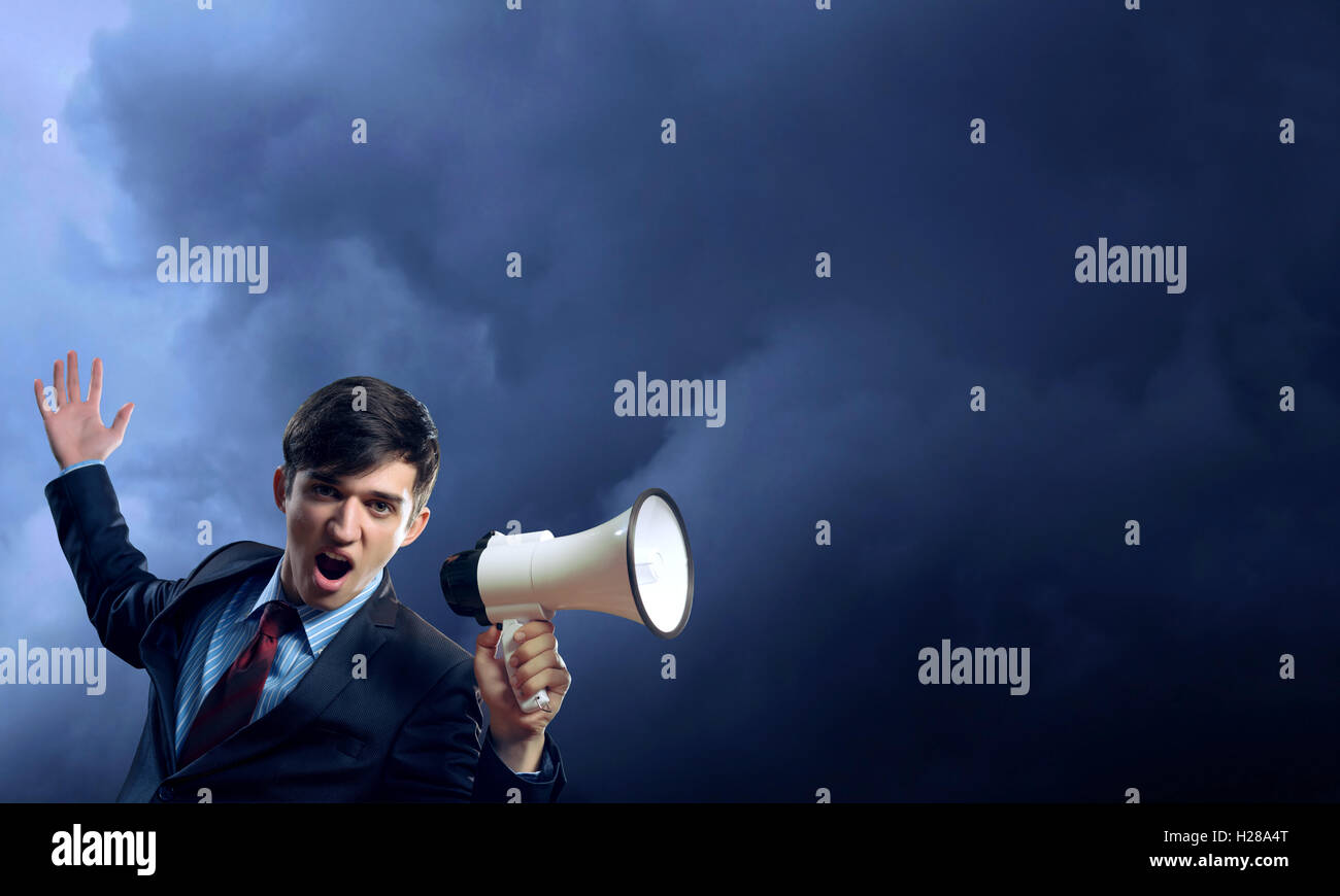 businessman shouting into a megaphone Stock Photo - Alamy