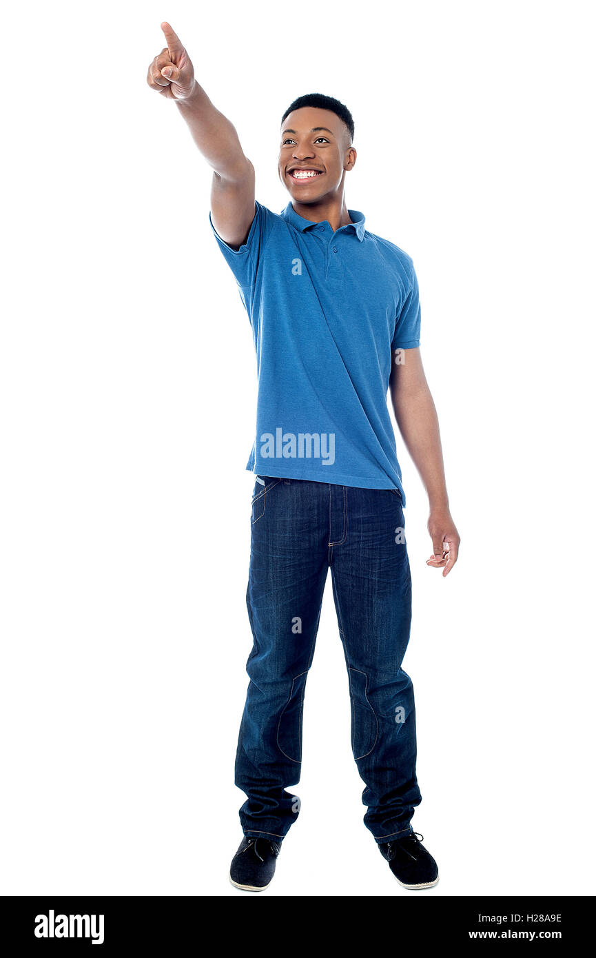 Happy man pointing away Cut Out Stock Images & Pictures - Alamy