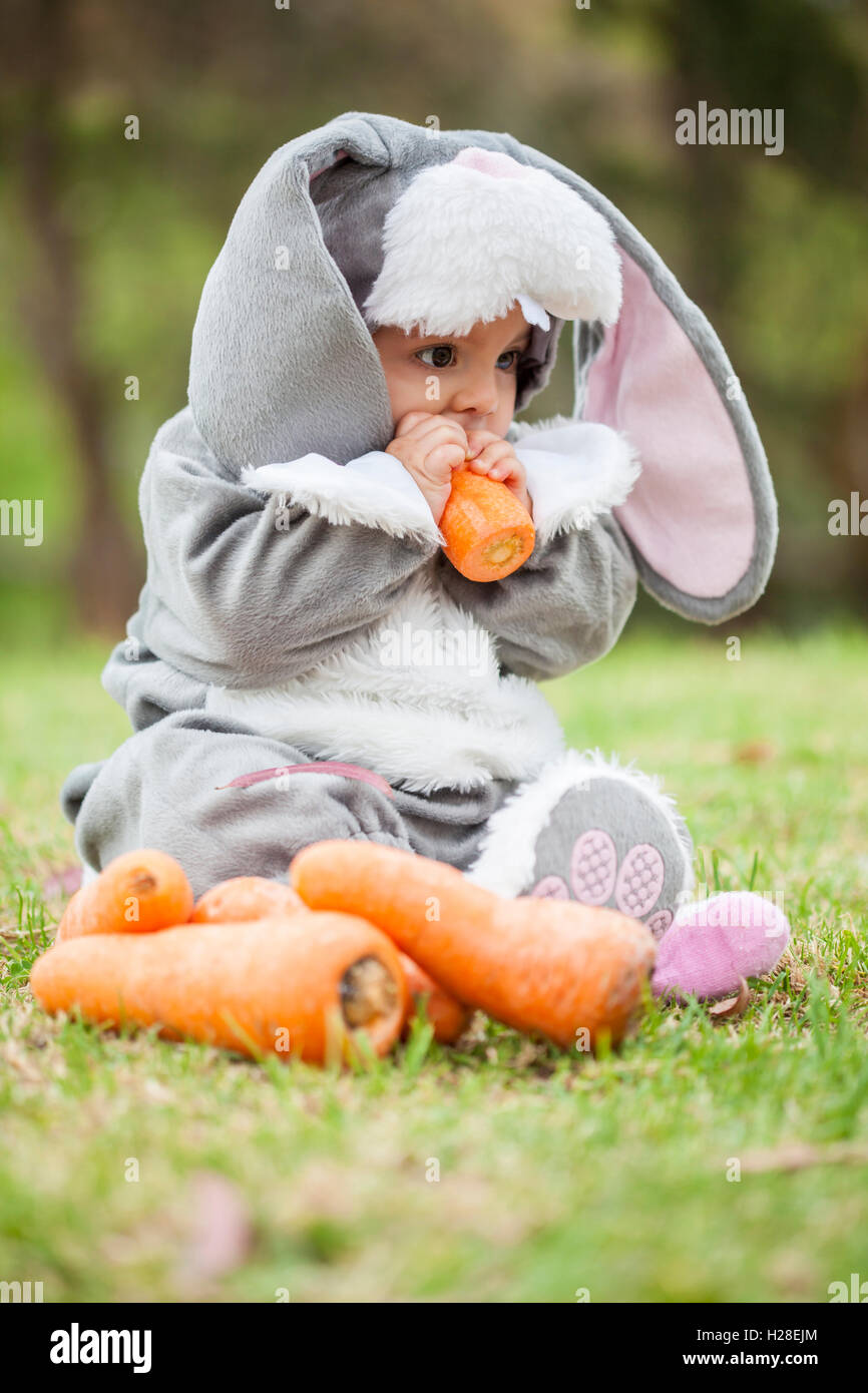 Little baby girl wearing a rabbit costume Stock Photo - Alamy