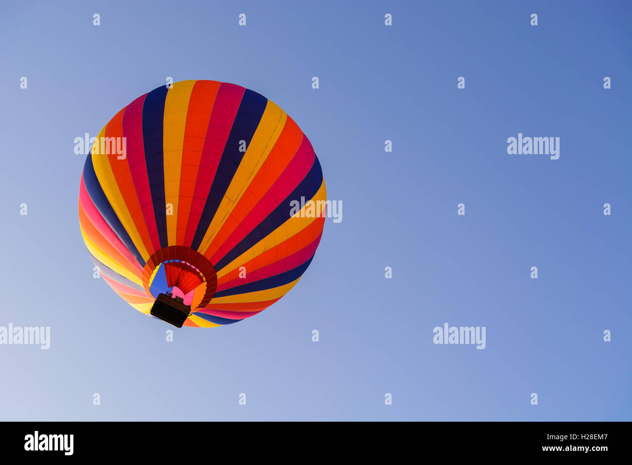 Colorful balloon on blue sky Stock Photo - Alamy